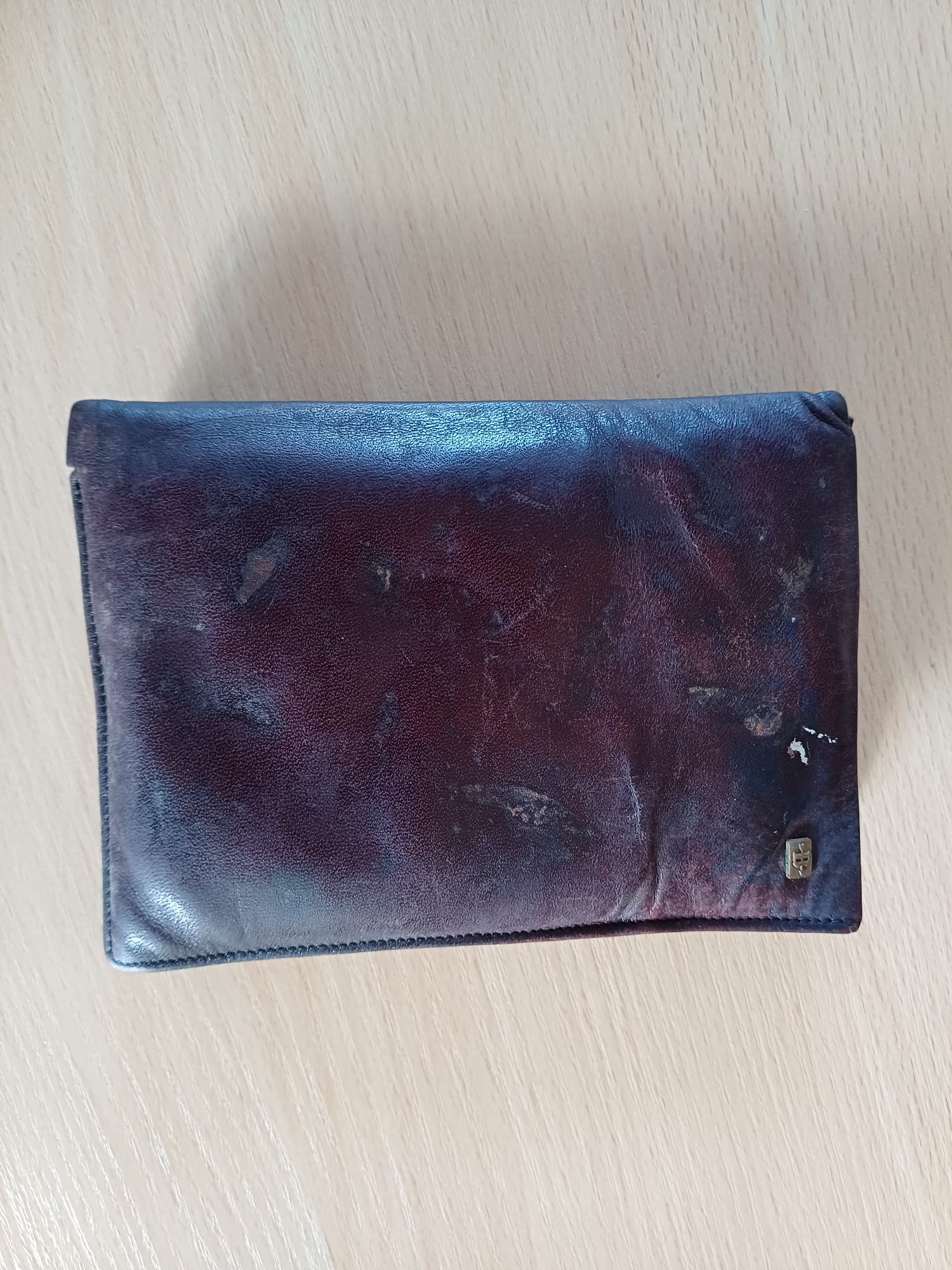 Wallet buried under museum display for over 30 years discovered in ...